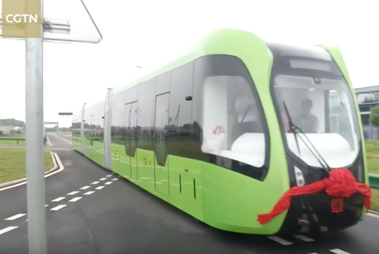 Virtual-rail train system operates on city roads without steel tracks ...