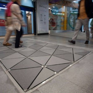 These floor tiles harvest the kinetic energy from human footsteps ...